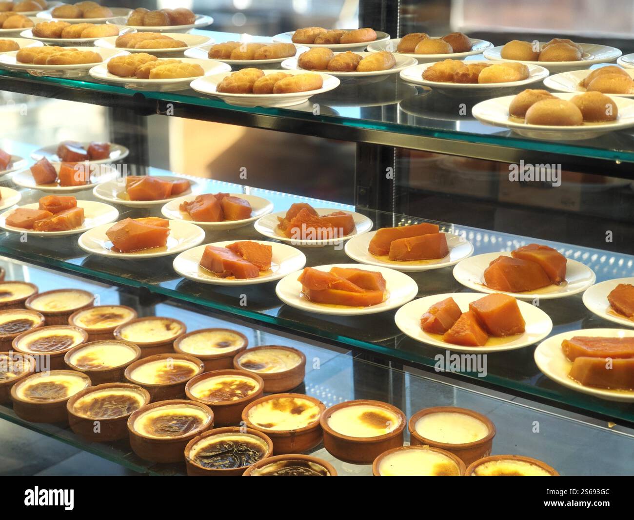 Delightful display of traditional Turkish desserts such as sutlac ...