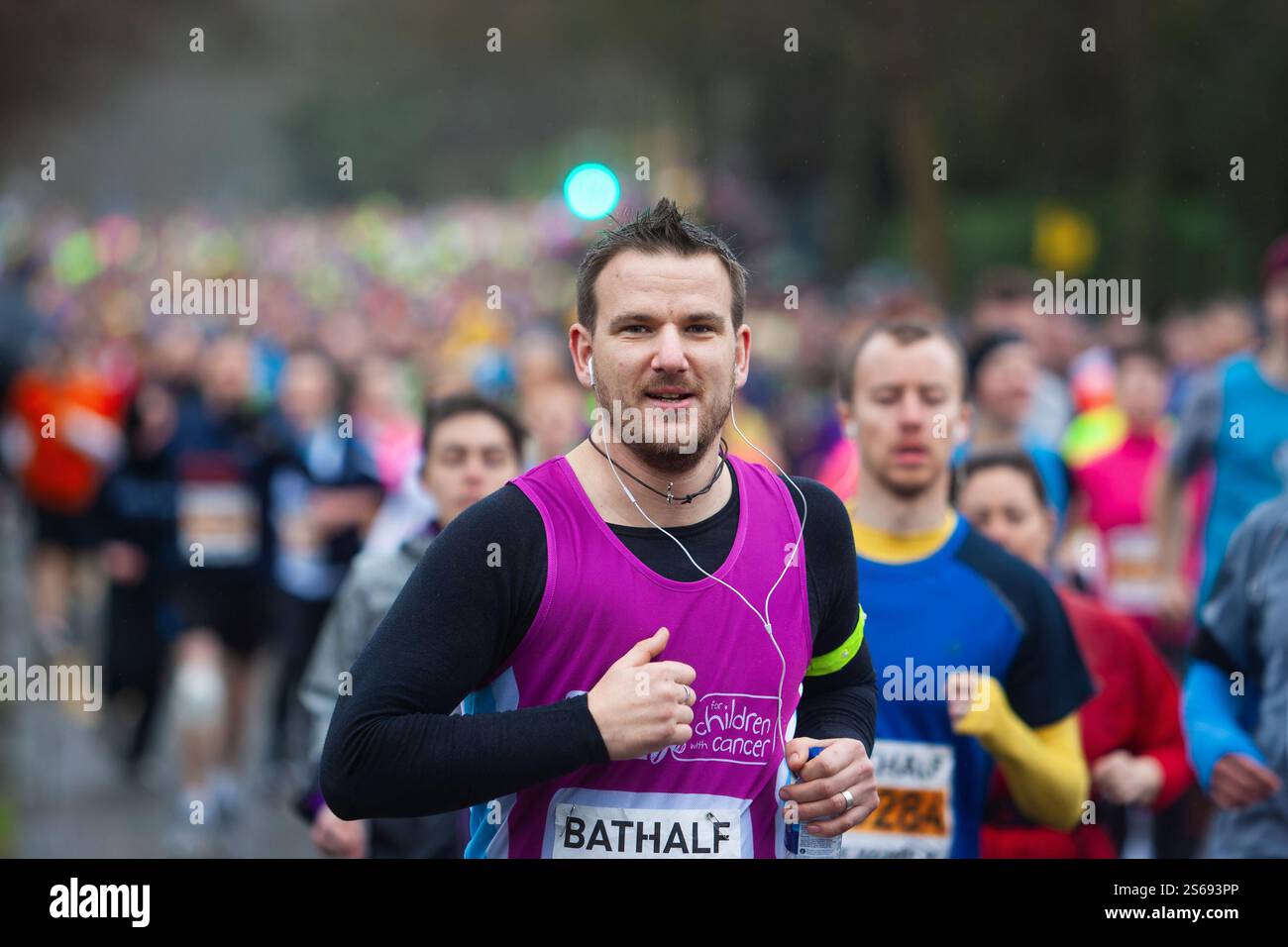 Male and female athletes running and competing in the Bath Half ...