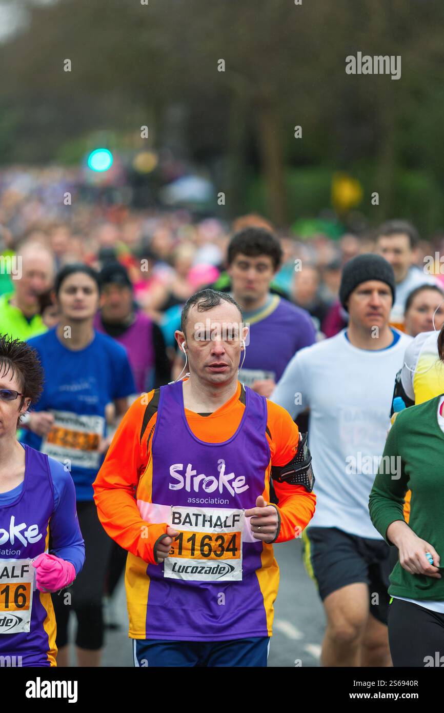 Male and female athletes running and competing in the Bath Half ...