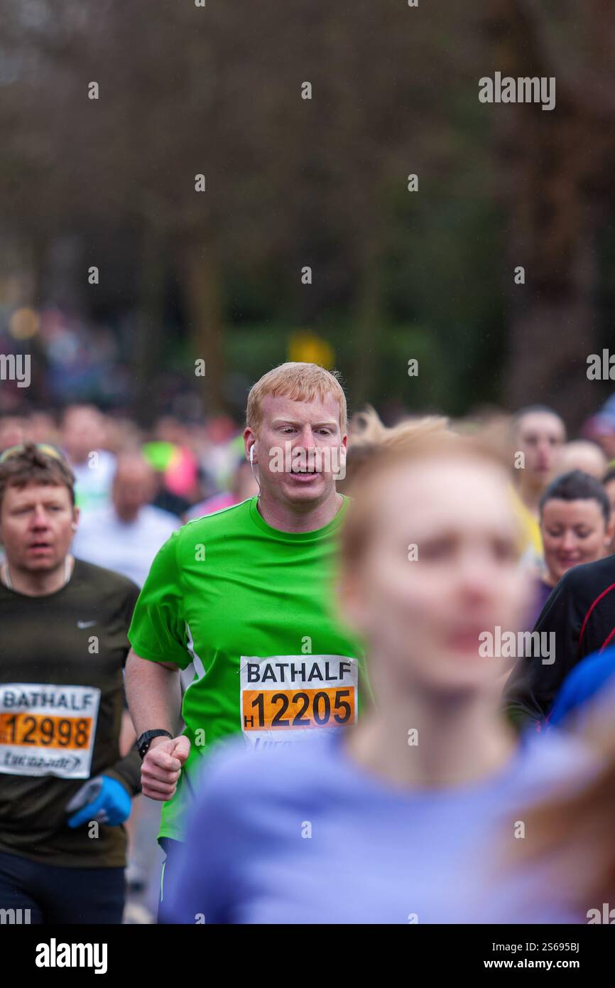 Male and female athletes running and competing in the Bath Half ...