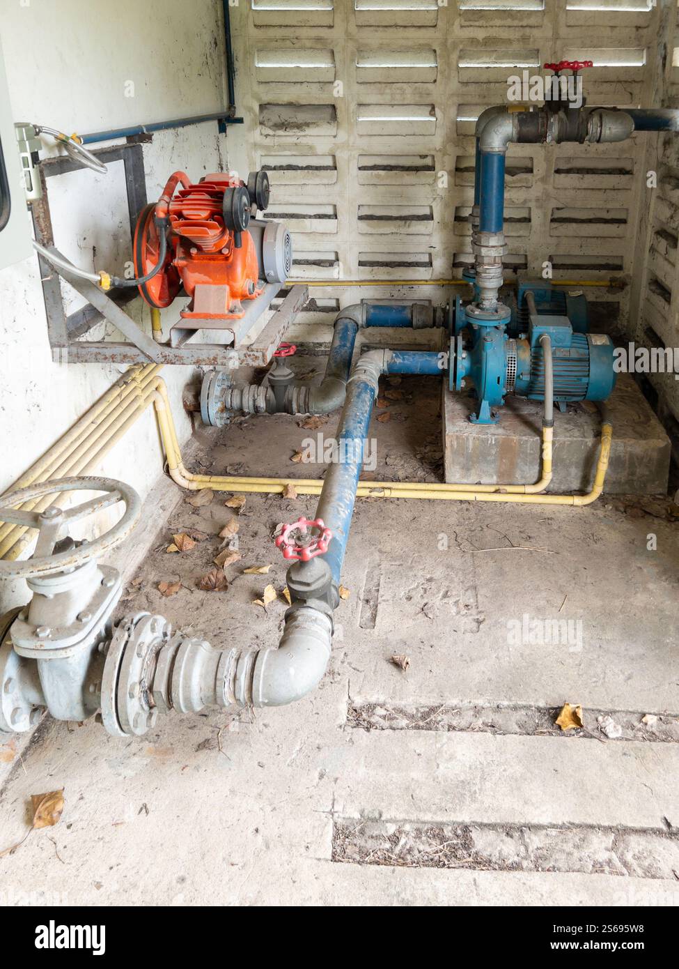 A water pump system installed in a utility room designed for ...