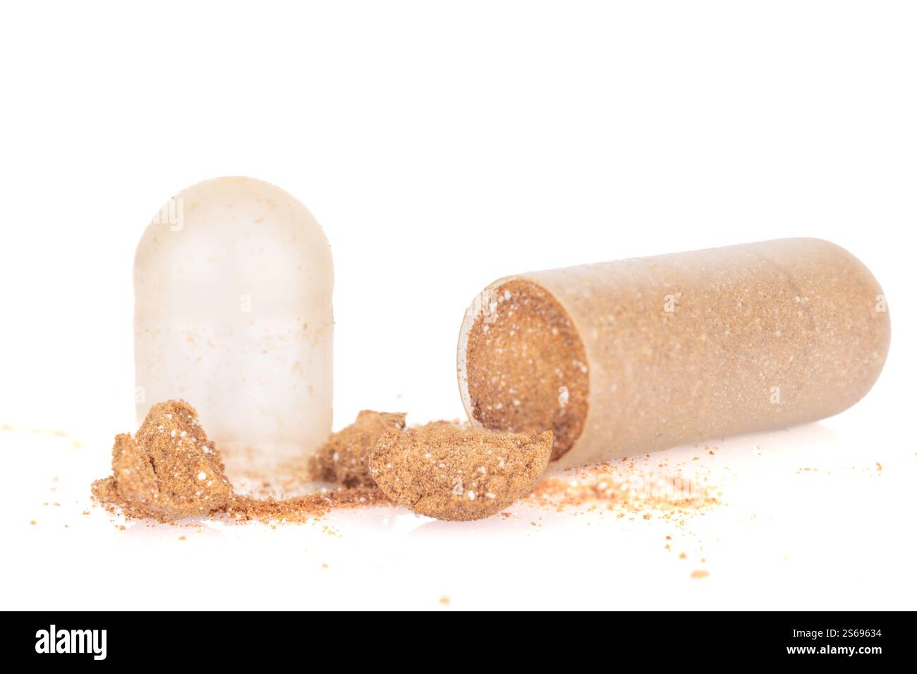 Expired and Hardened Capsule with Spilled Powder on White Background ...