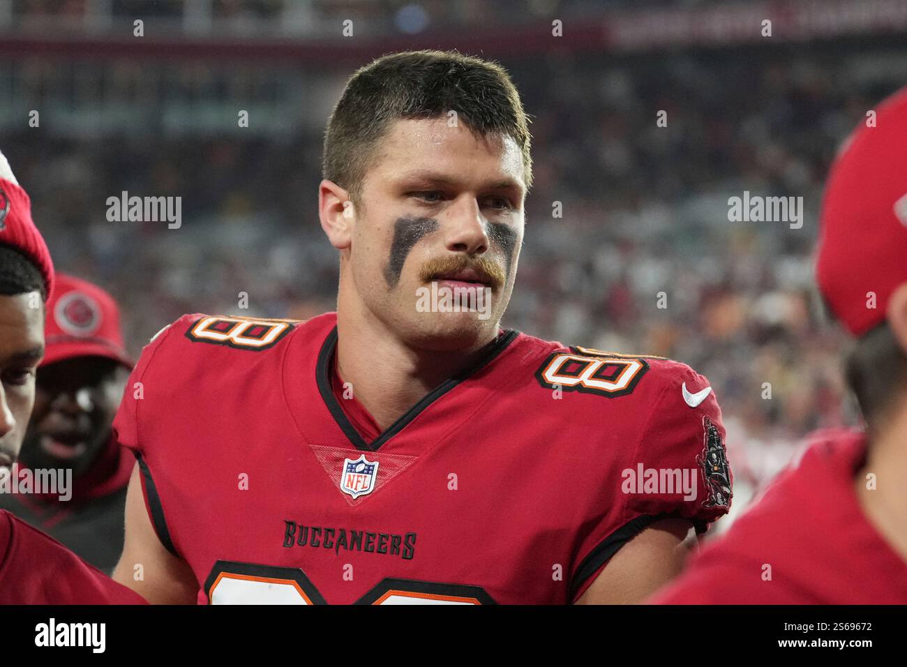 Tampa Bay Buccaneers tight end Cade Otton (88) leaves the field at half ...