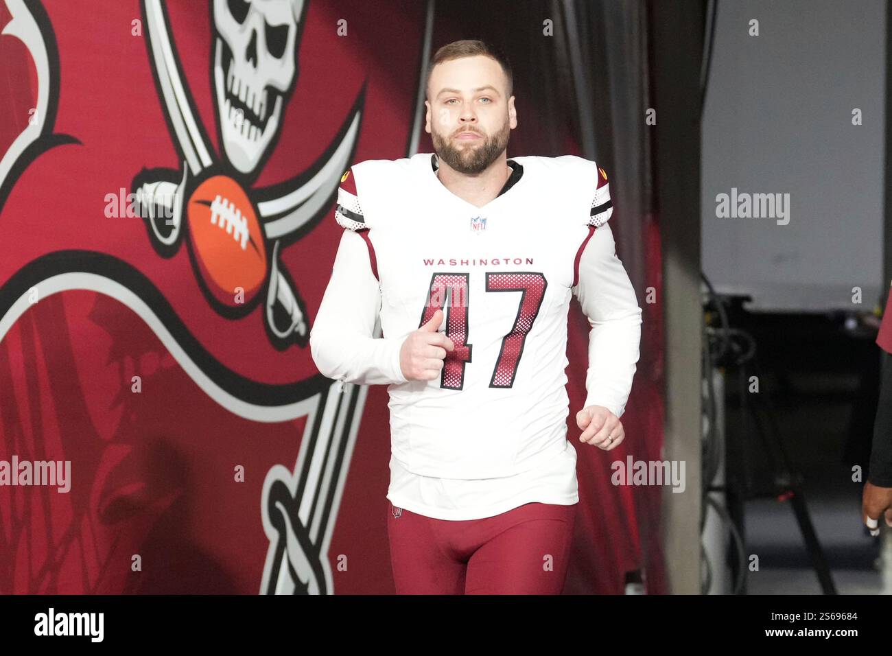 Washington Commanders place kicker Zane Gonzalez (47) enters the field ...