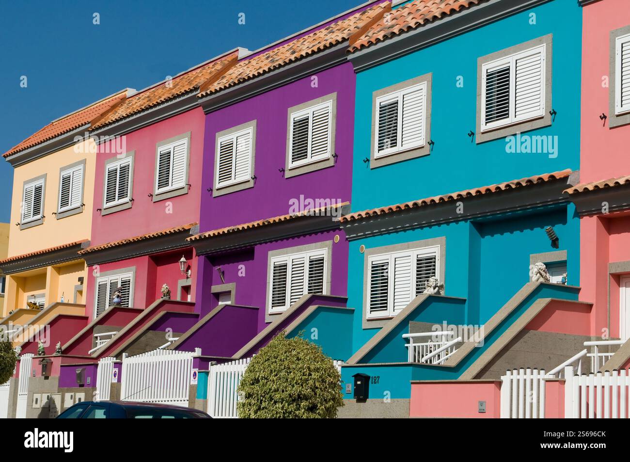 houses with a lot of colours in a town Stock Photo - Alamy