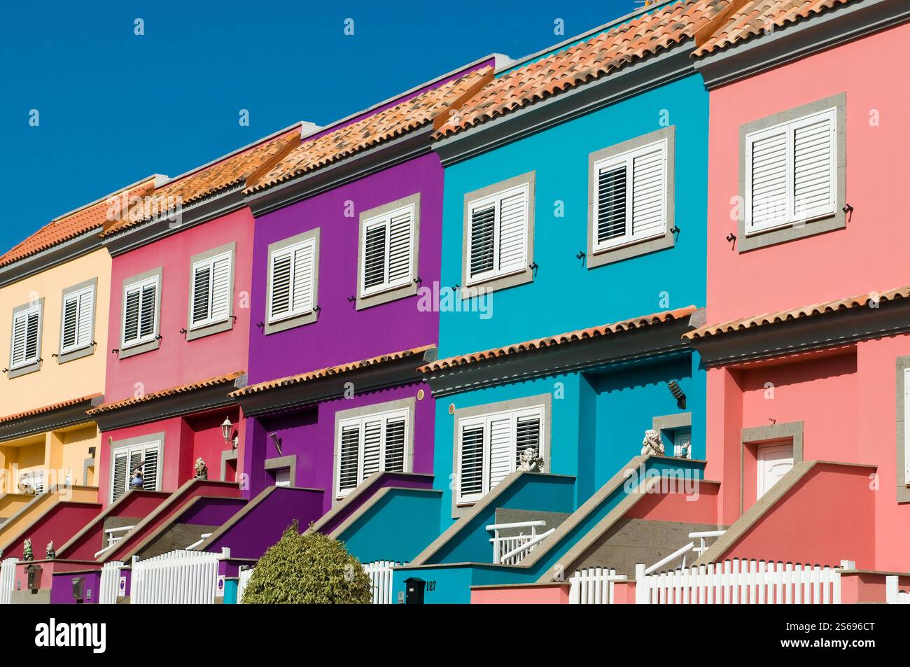 houses with a lot of colours in a town Stock Photo - Alamy