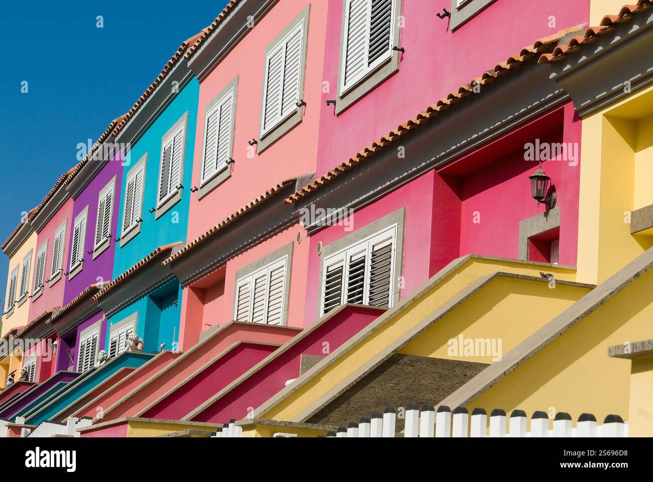 houses with a lot of colours in a town Stock Photo - Alamy