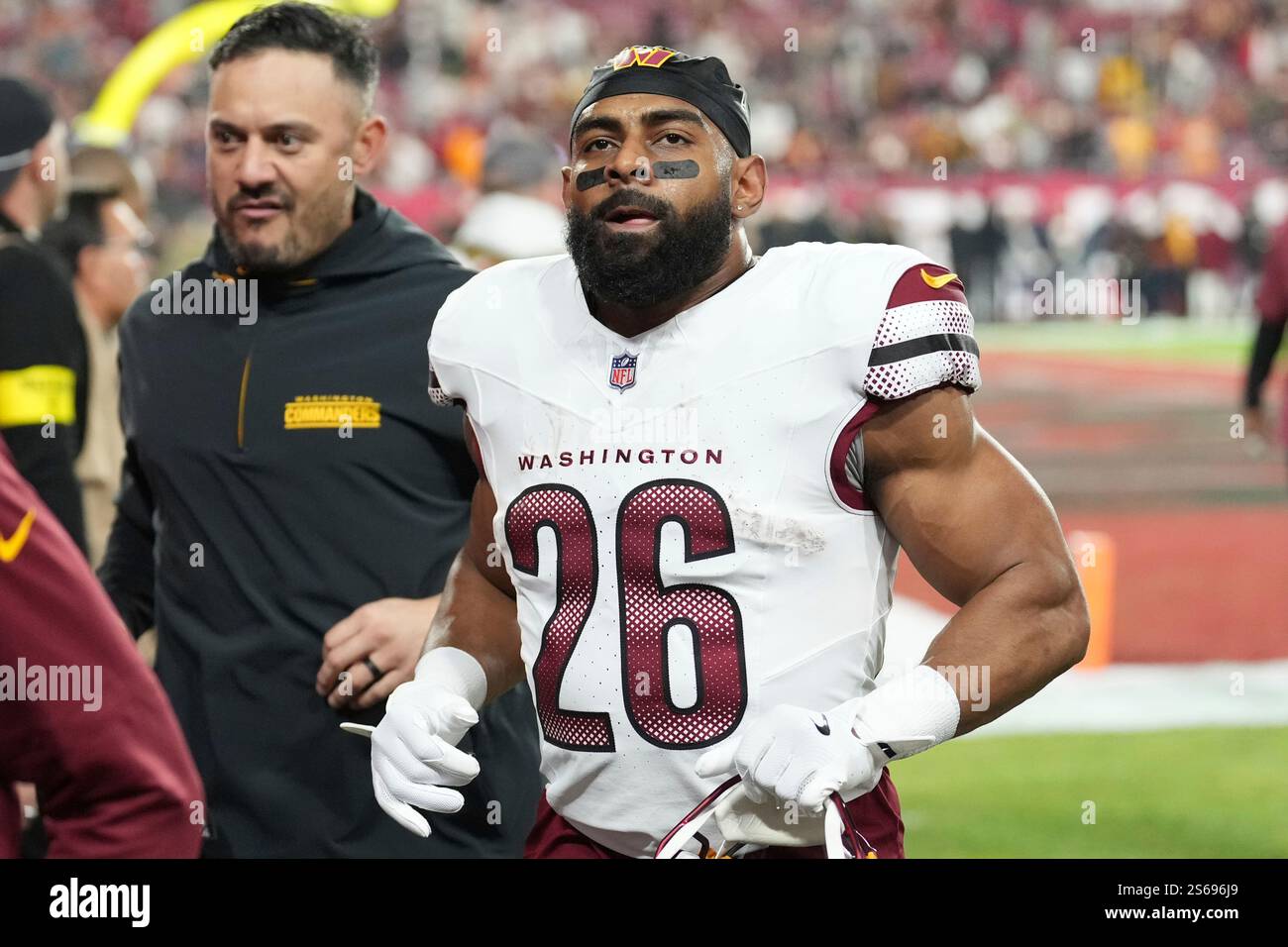 Washington Commanders running back Jeremy McNichols (26) leaves the ...
