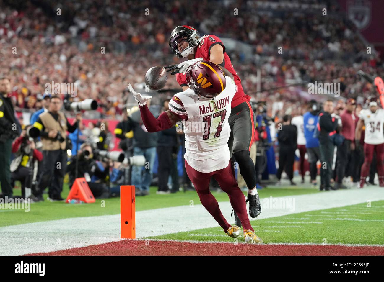 Tampa Bay Buccaneers cornerback Zyon McCollum (27) breaks up a pass to ...