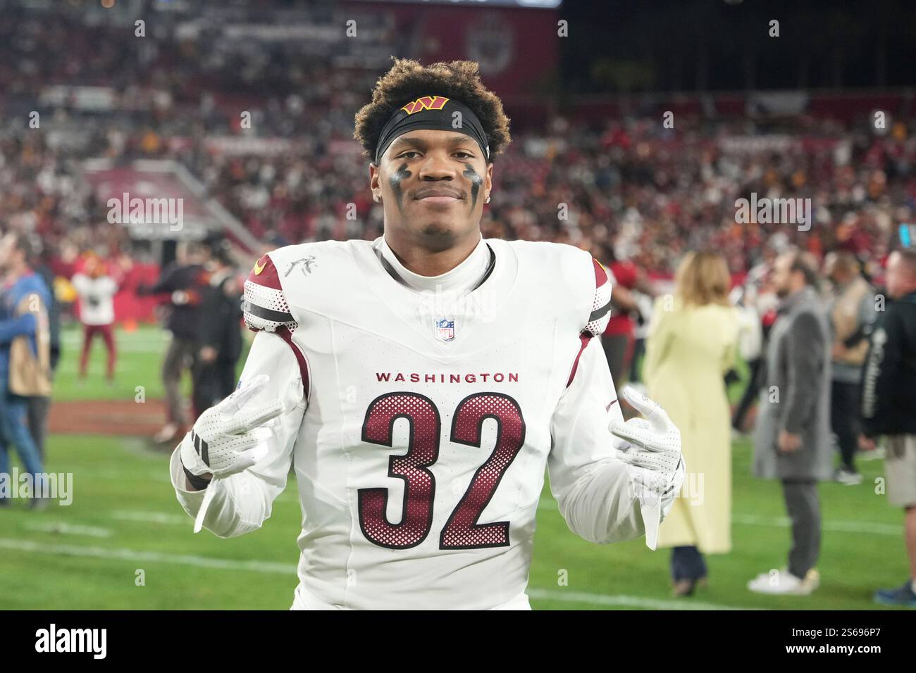 Washington Commanders linebacker Mykal Walker (32) smiles following an ...