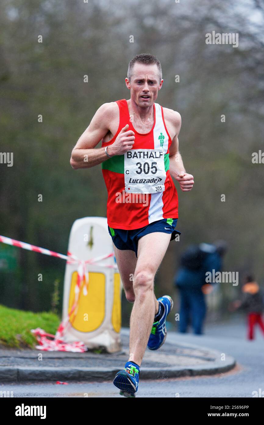 Male athletes running and competing in the Bath Half Marathon road race ...