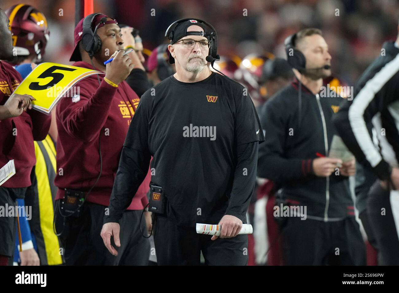 Washington Commanders head coach Dan Quinn walks he sidelines during an ...