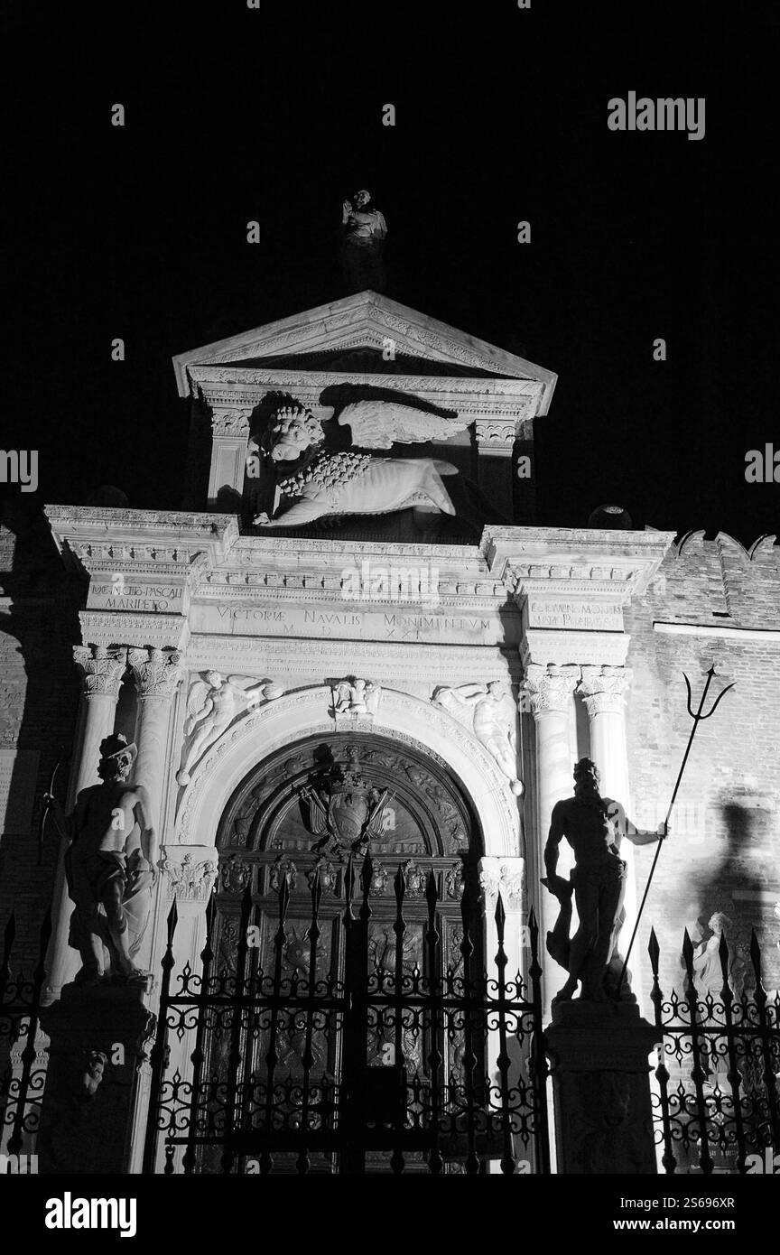 Venice, Italy. Venetian Arsenal building illuminated at night. Black ...