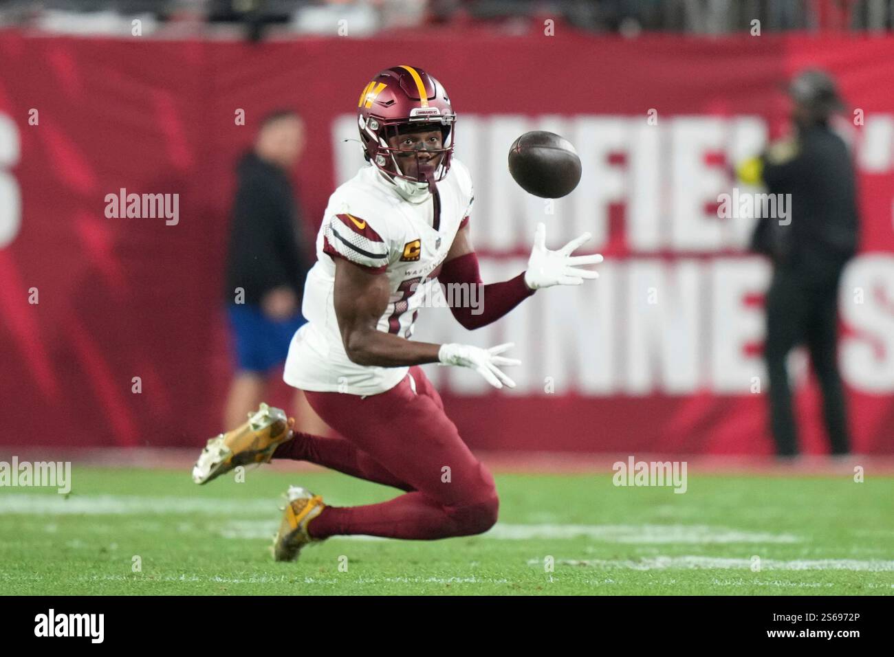 Washington Commanders safety Jeremy Chinn (11) eyes an incoming pass ...