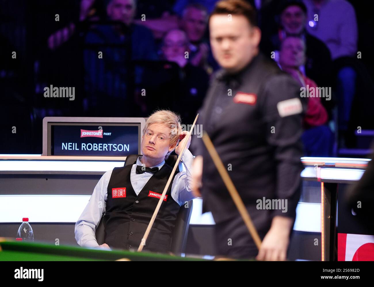 Neil Robertson watches on during his match against Shaun Murphy on day ...