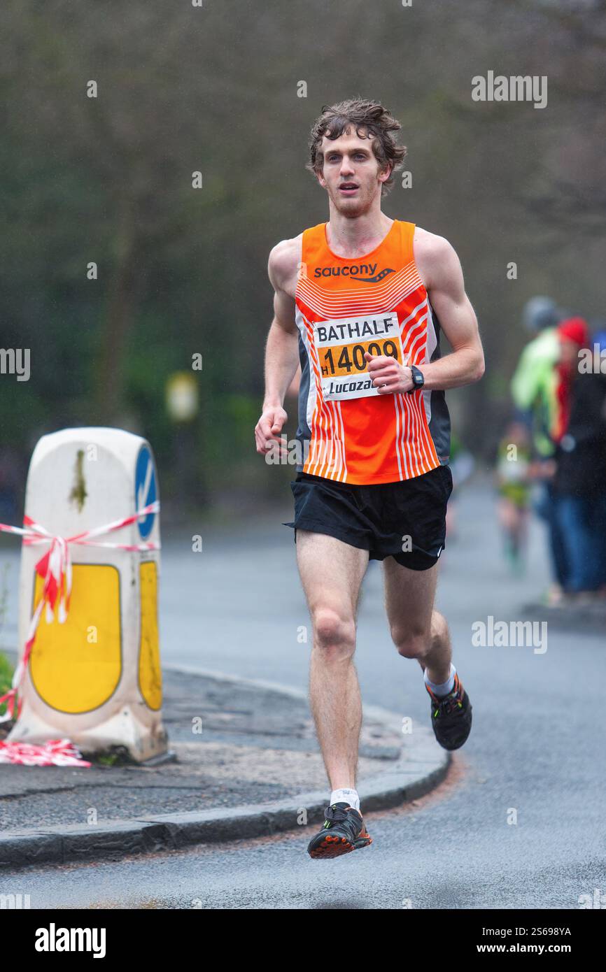 Male athletes running and competing in the Bath Half Marathon road race ...