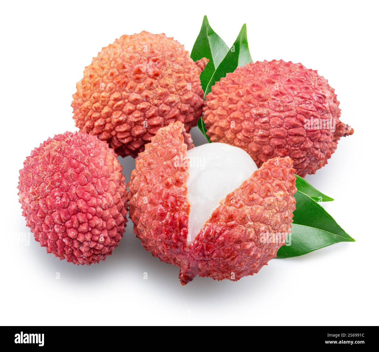 Lychee fruits with green leaves and one lychee peeled in half isolated ...