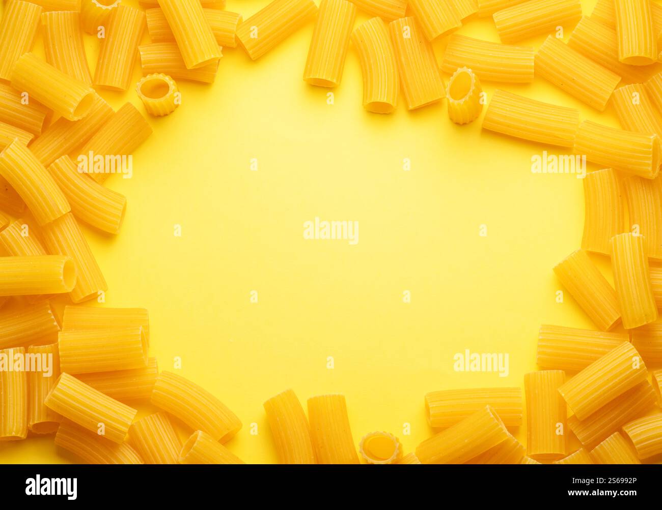 Italian dry pasta rigatoni close-up. Food background Stock Photo - Alamy