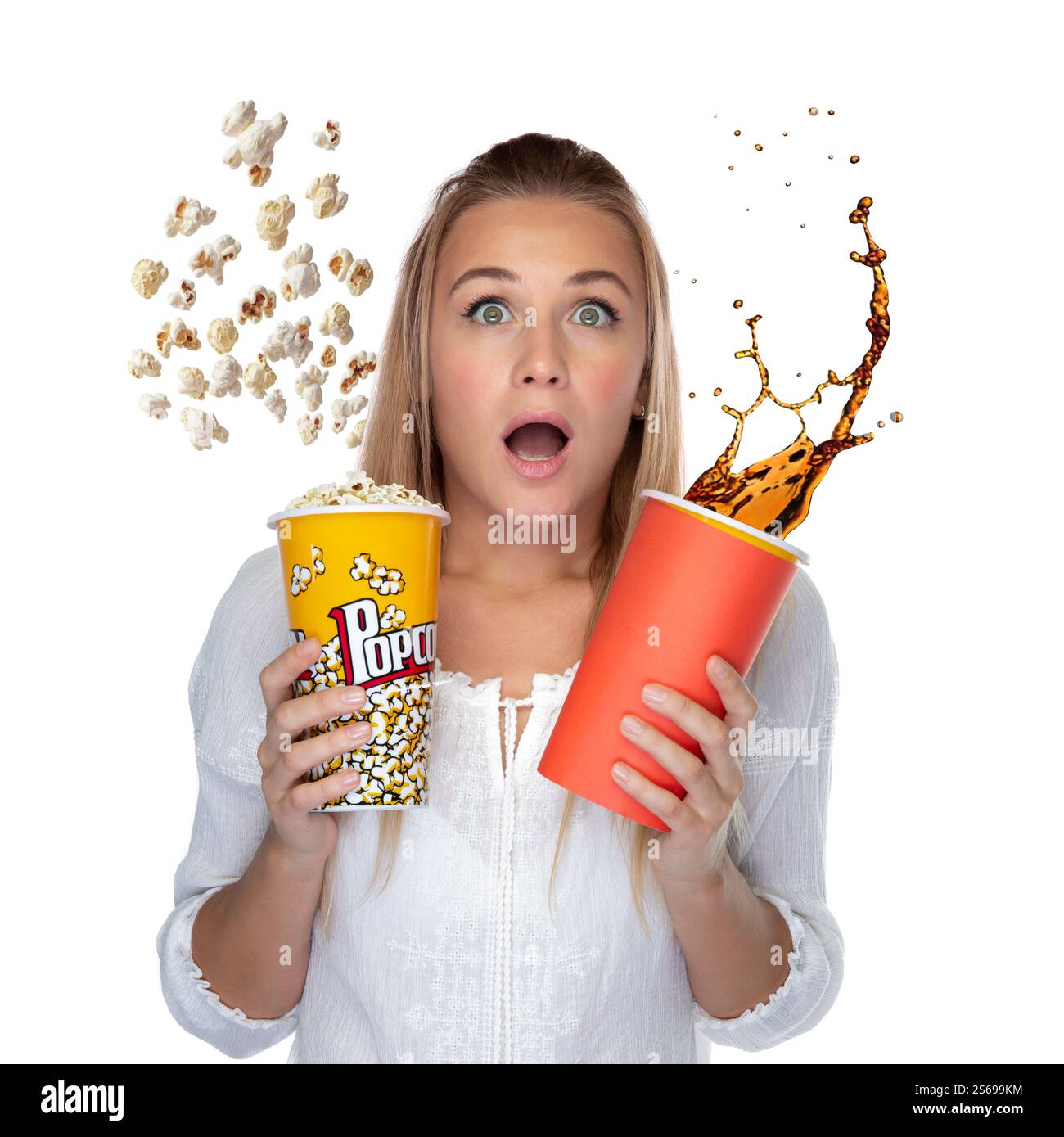 Excited Young Woman Enjoying Popcorn and a Refreshing Drink at the ...