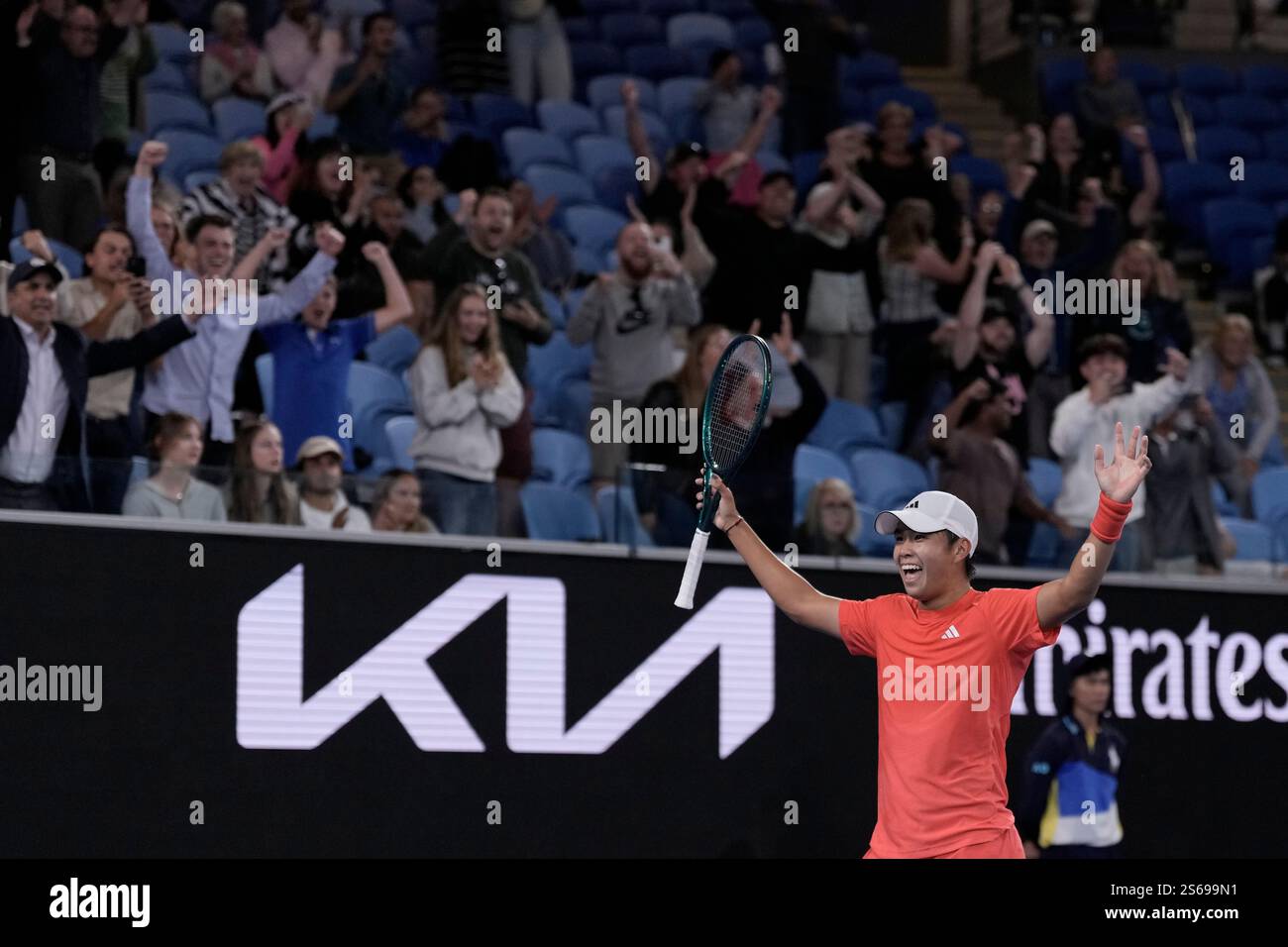 Learner Tien of the U.S. celebrates after winning his second round ...