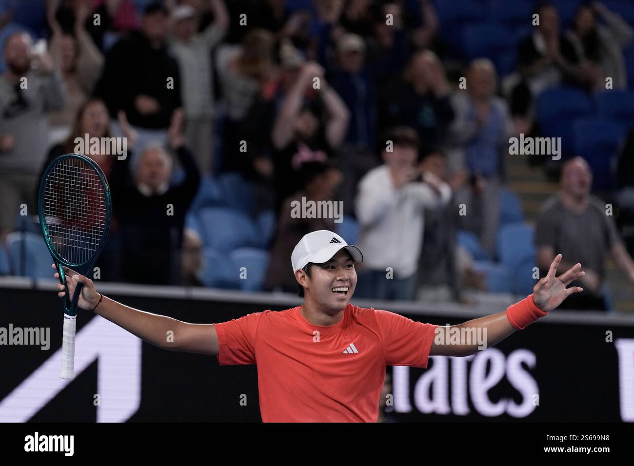 Learner Tien of the U.S. celebrates after winning his second round ...