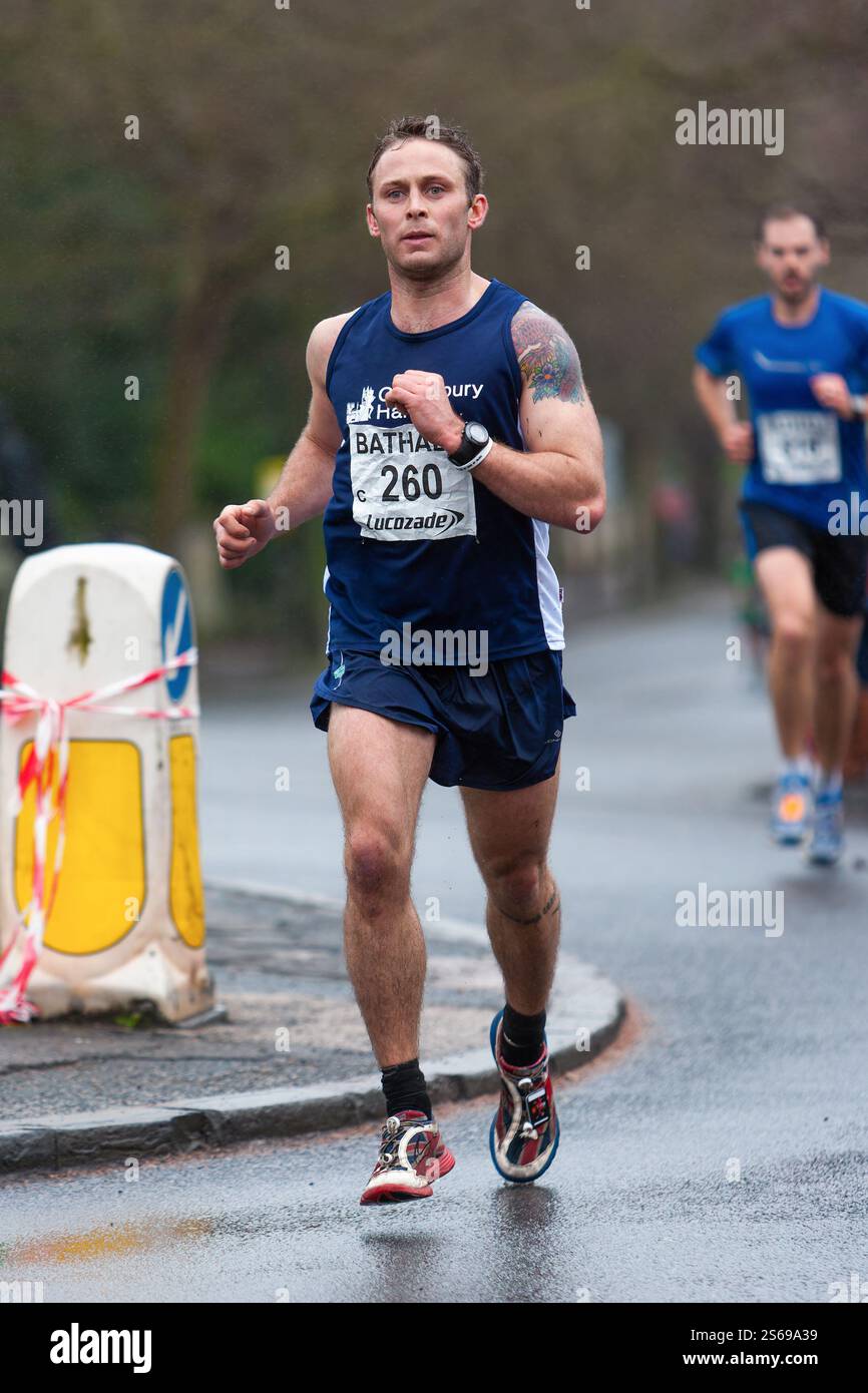 Male athletes running and competing in the Bath Half Marathon road race ...