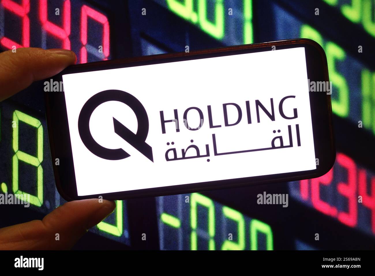 January 16, 2025, Poland: In this photo illustration, the Q Holding ...