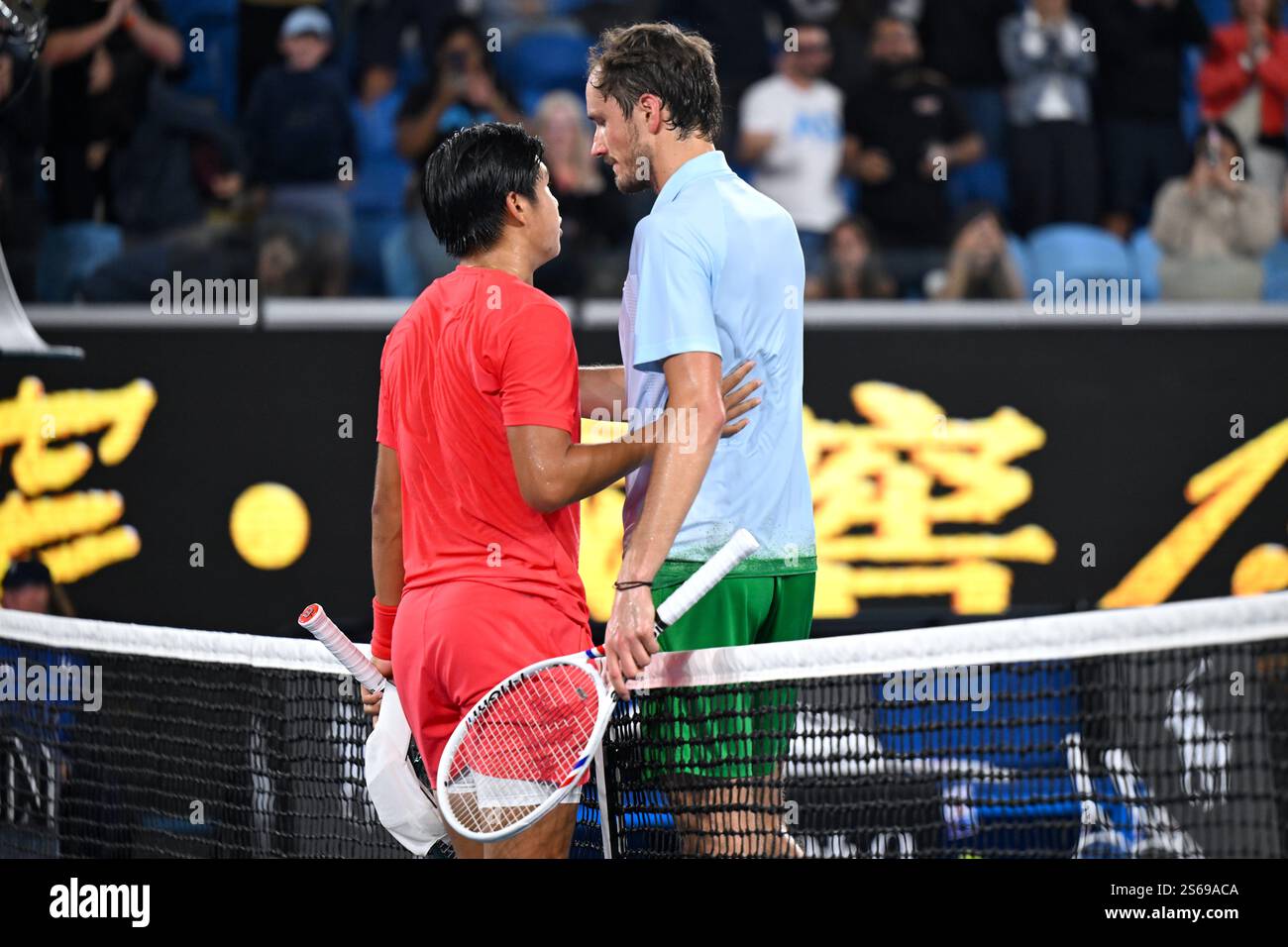 Learner Tien of USA speaks to Daniil Medvedev of Russia after winning ...