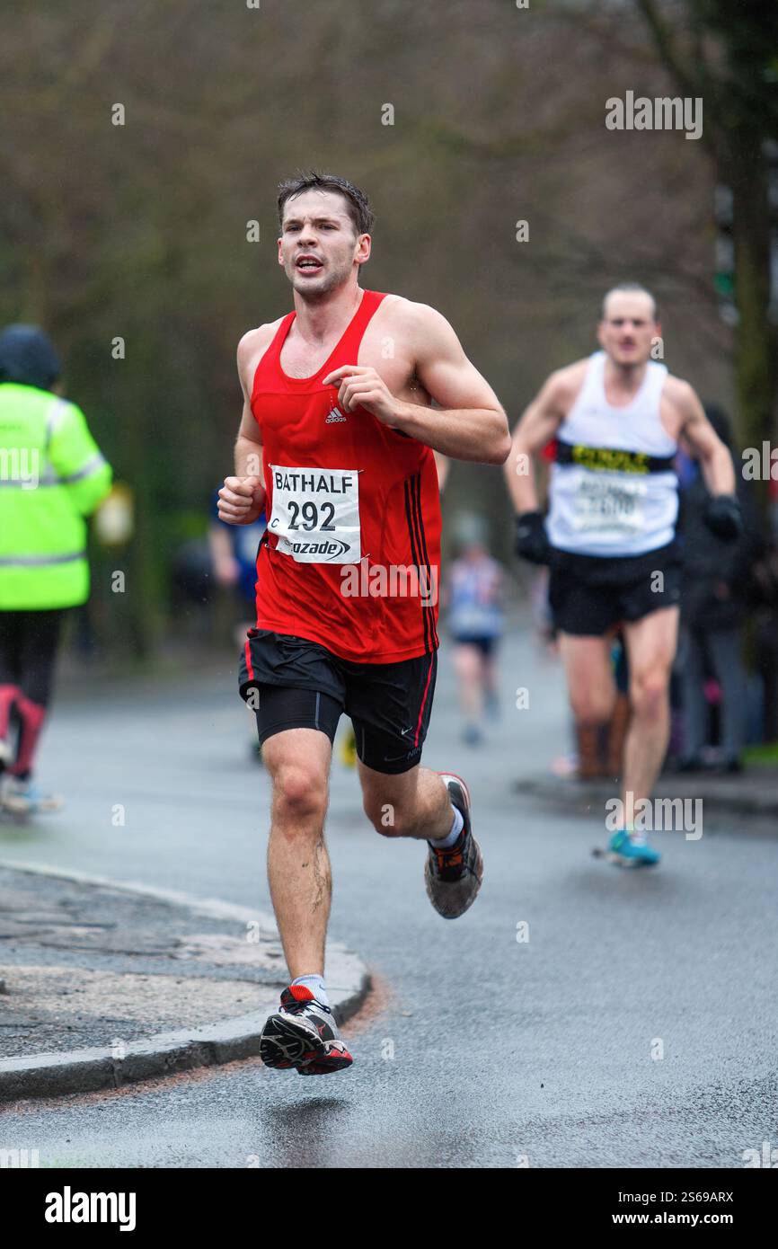 Male athletes running and competing in the Bath Half Marathon road race ...