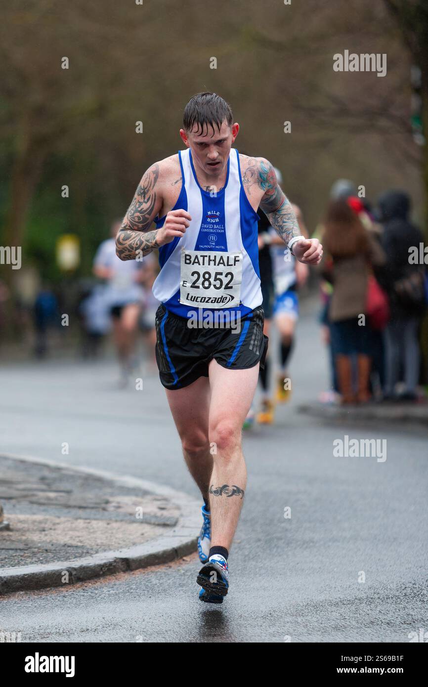 Male athletes running and competing in the Bath Half Marathon road race ...
