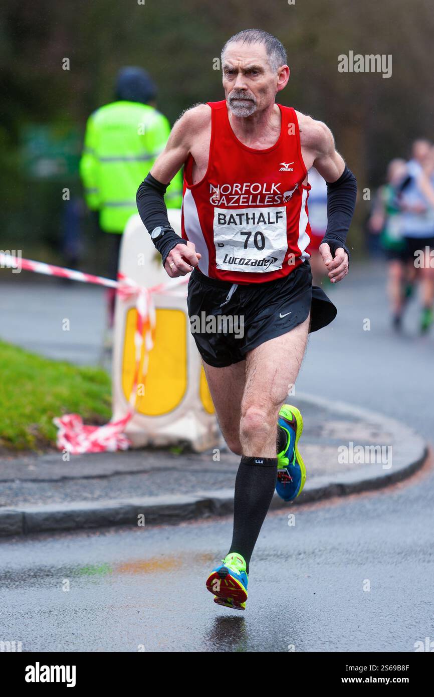 Male athletes running and competing in the Bath Half Marathon road race ...