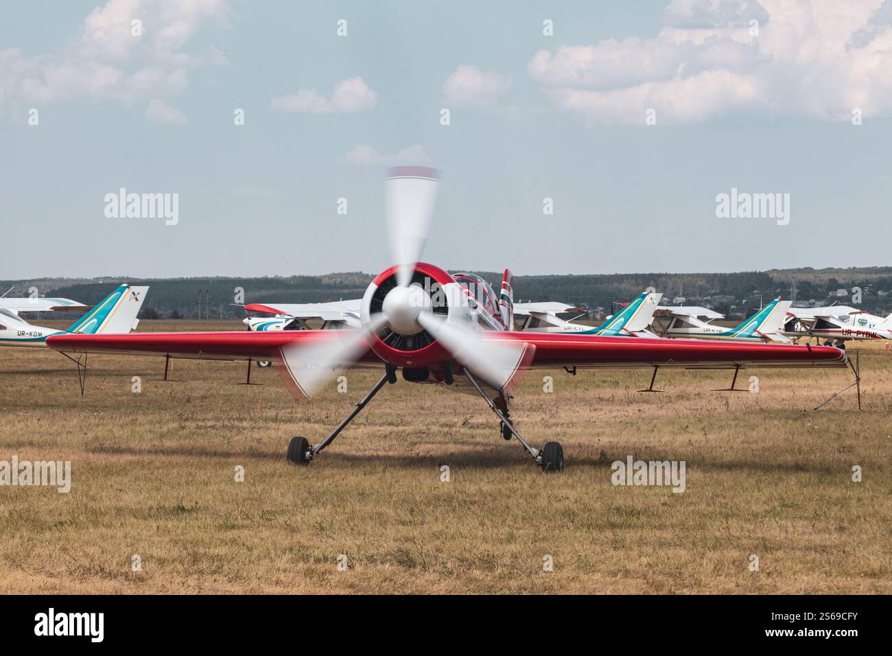 Kharkiv, Ukraine - August 29, 2021: Light red aircraft plane Su-31 with ...