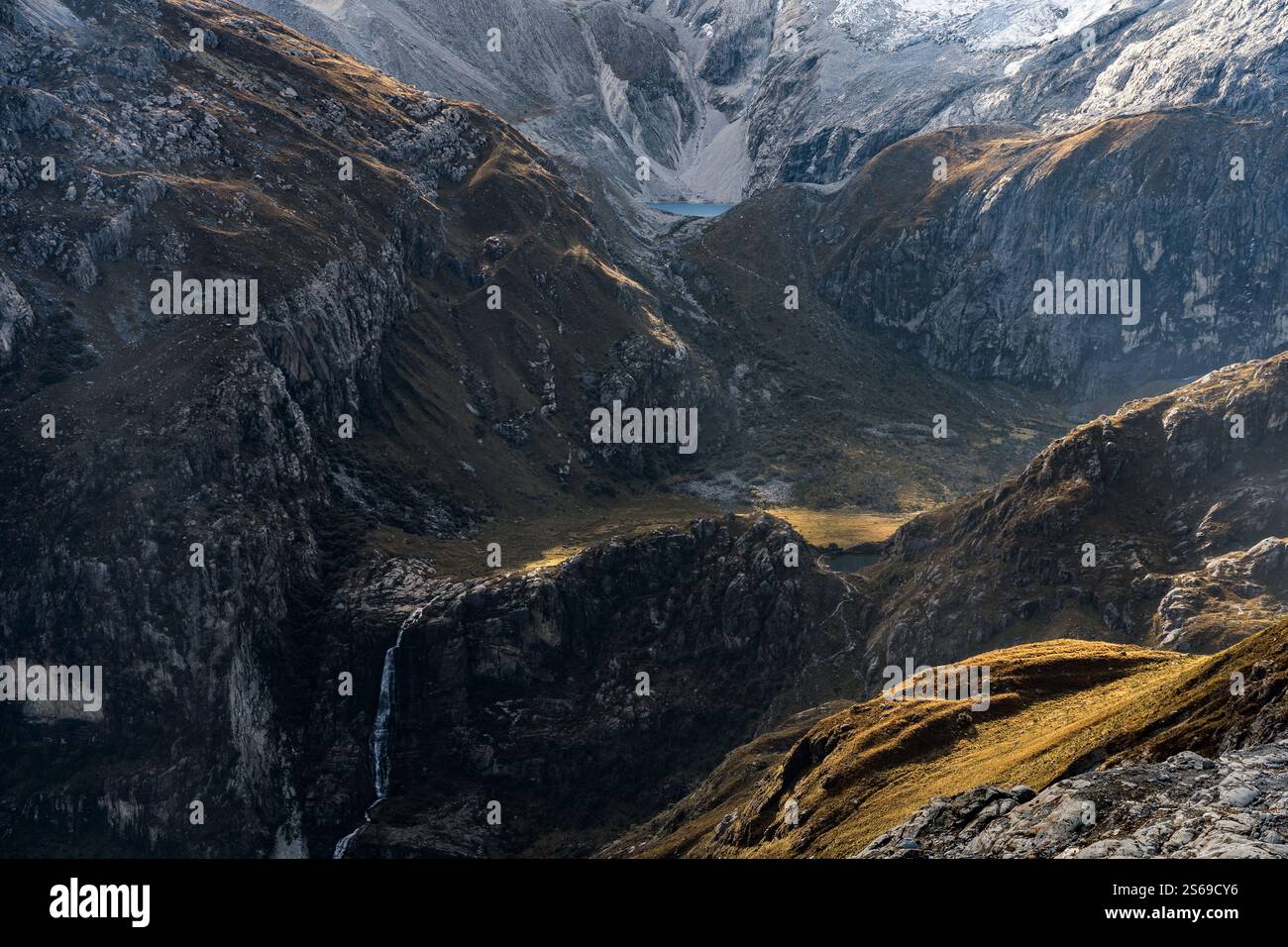 snow-capped mountains with glaciers surrounded by rock walls and ...