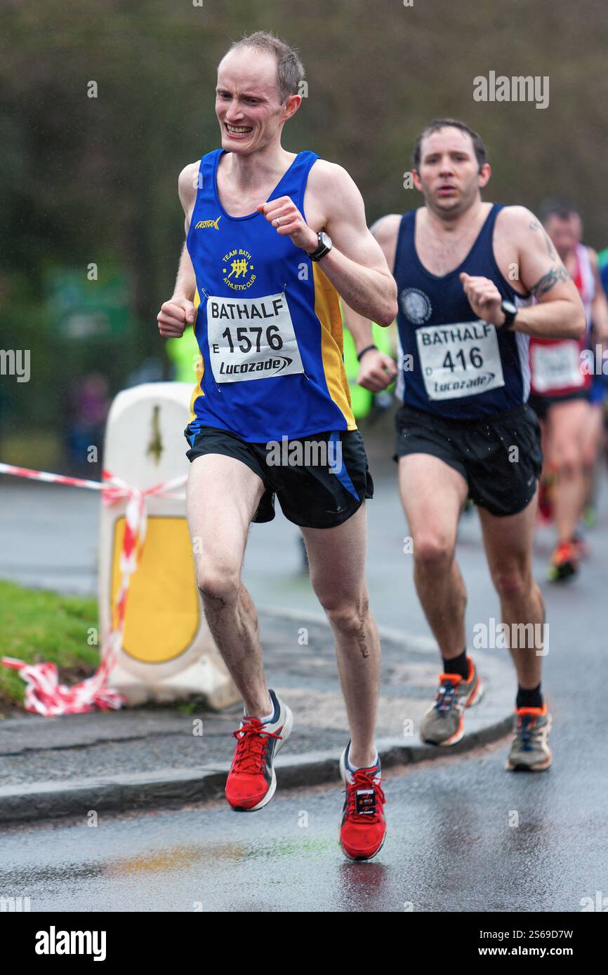 Male athletes running and competing in the Bath Half Marathon road race ...