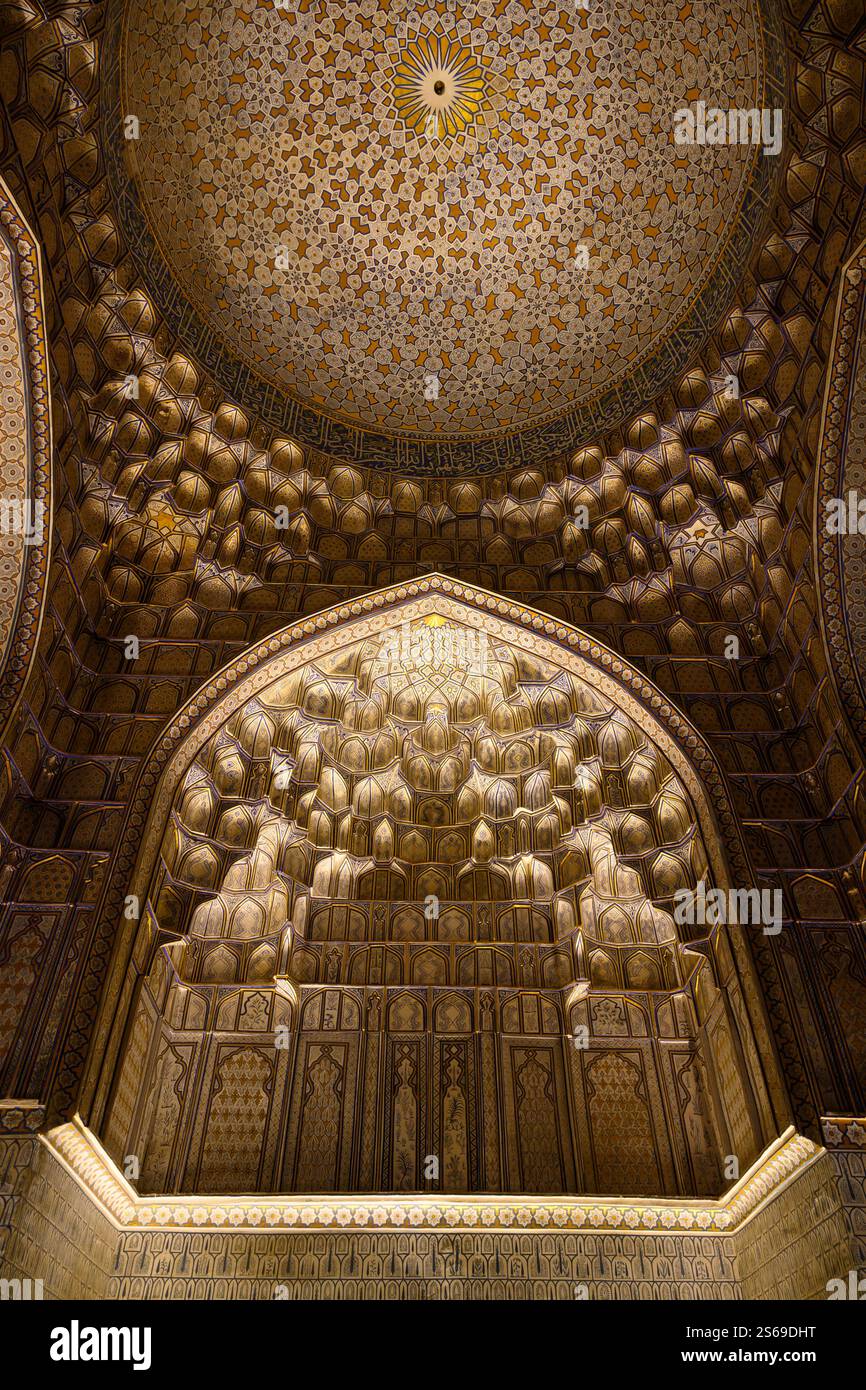 An inside view of the dome with golden-and-blue patterns, ancient ...