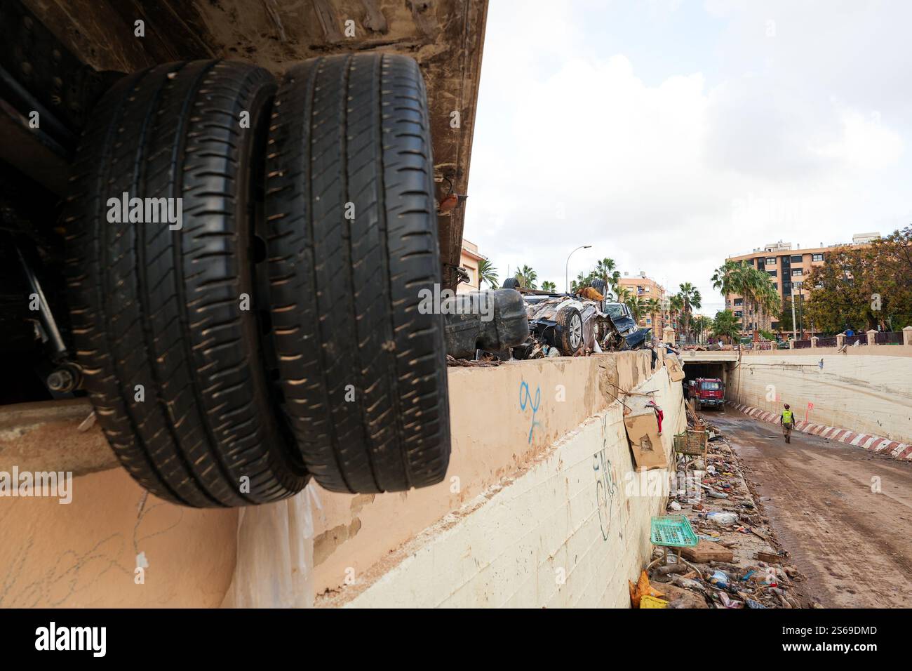Close view of derailed truck doble set of tires on the edge of a tunnel ...