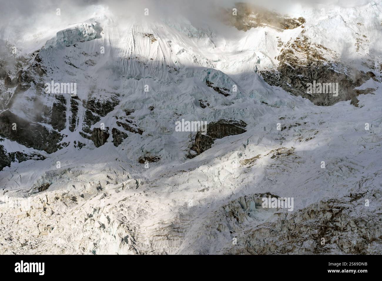 Stunning landscape of Andes mountain ridge cover by cloud and copyspace ...