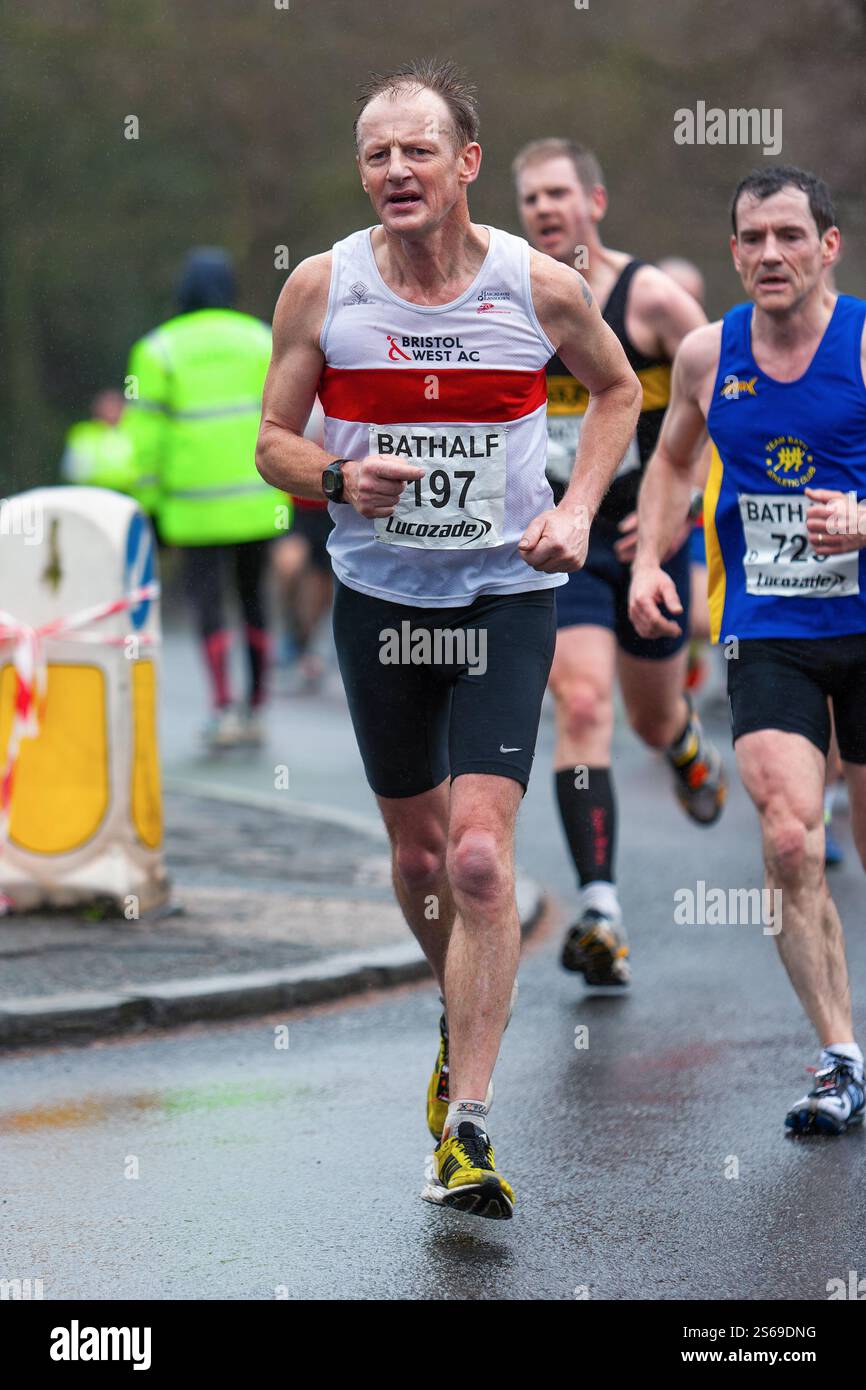 Male athletes running and competing in the Bath Half Marathon road race ...