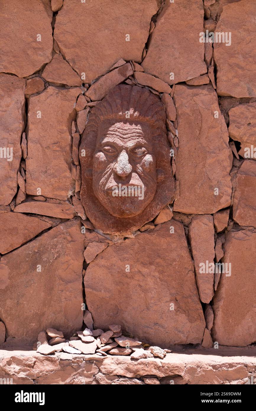 Carved faces represent natives who fought the Spanish on the memorial ...