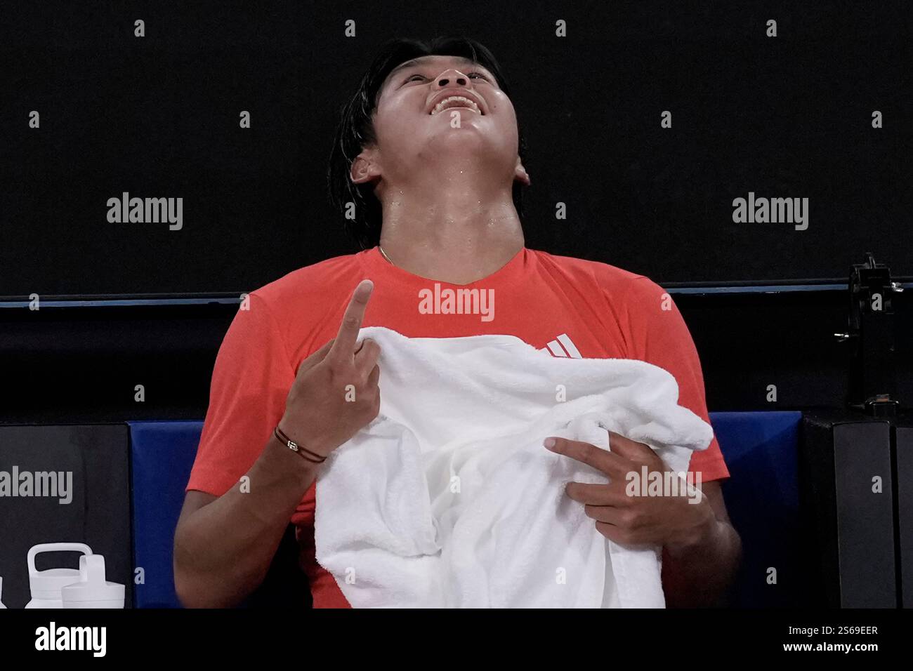 Learner Tien of the U.S. reacts after winning his second round match ...