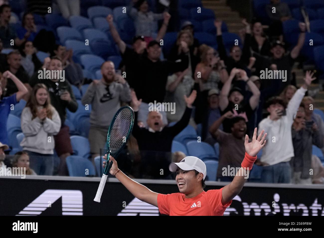 Learner Tien of the U.S. celebrates after winning his second round ...