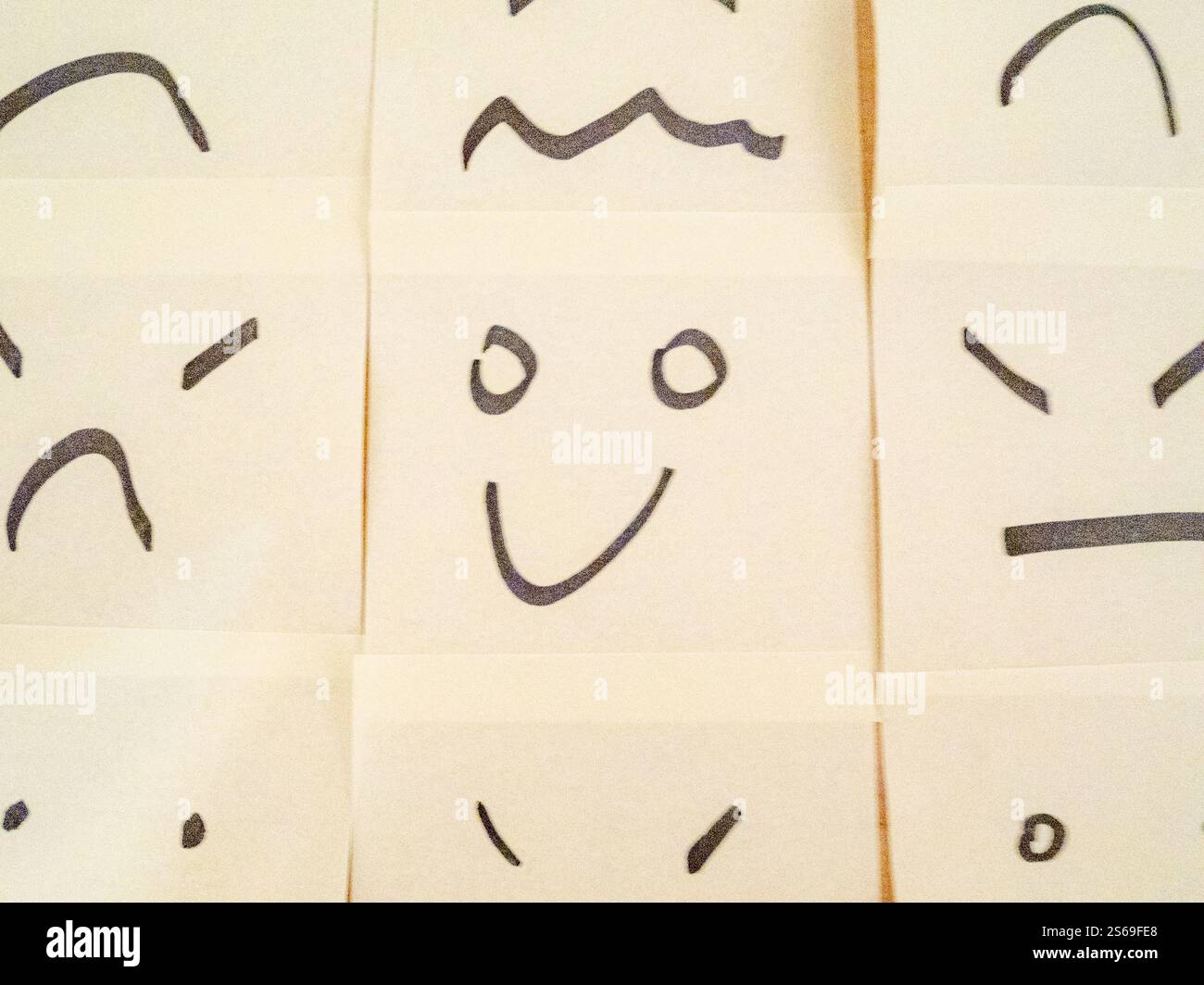 Happy emotional and around sad and angry faces Stock Photo - Alamy