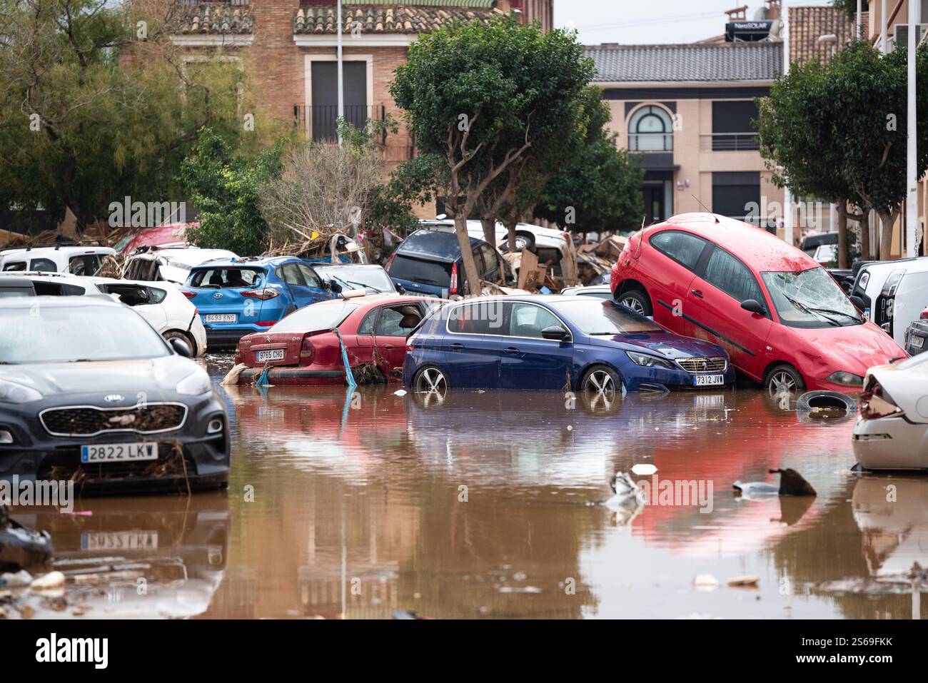 Flooded cars stuck and piled in outdoor parking after DANA flood ...