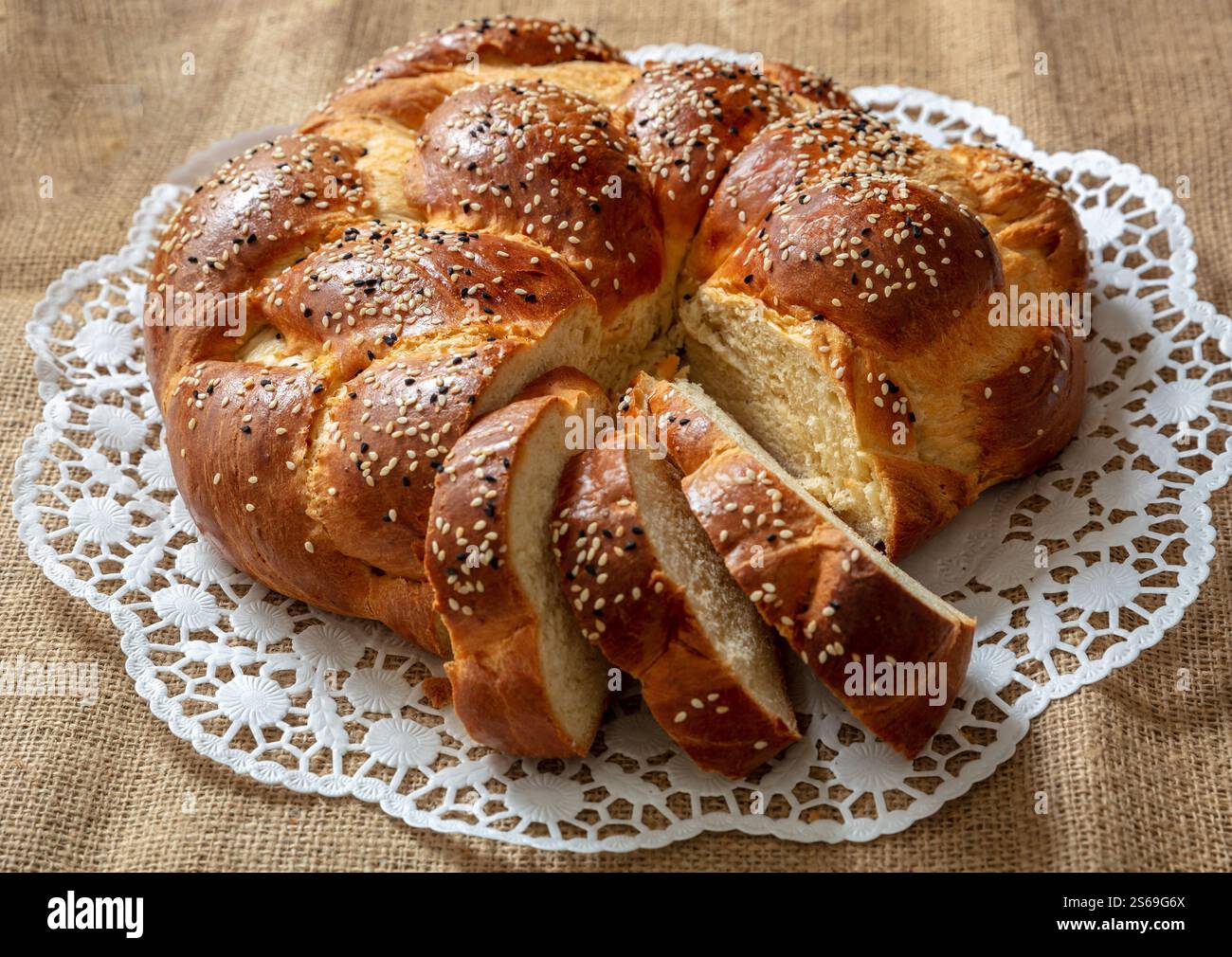 Easter bread, round shape greek tsoureki braid cut slices, closeup view from above Stock Photo ...