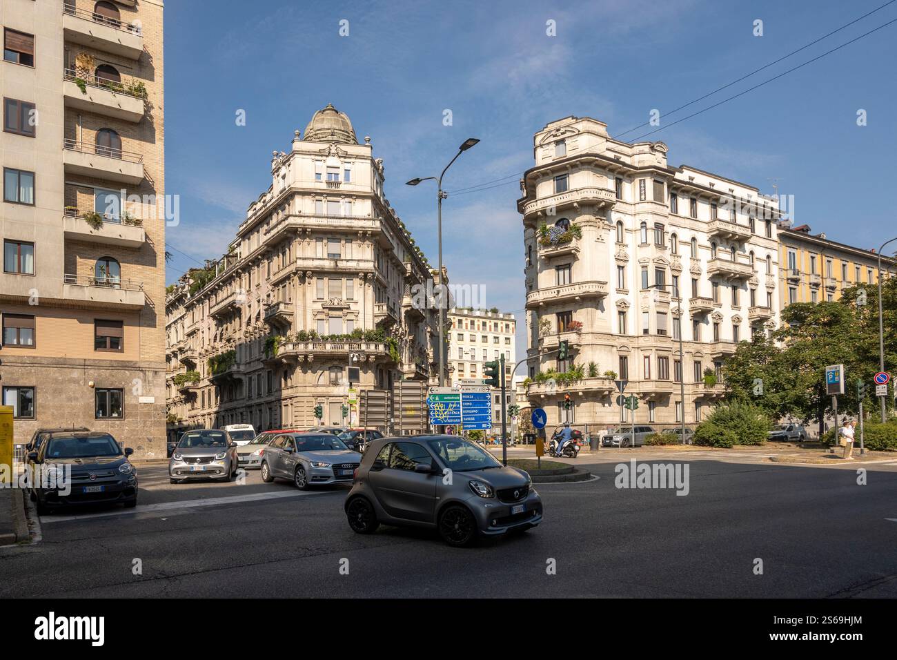 Traffic on the streets of Milan Stock Photo - Alamy