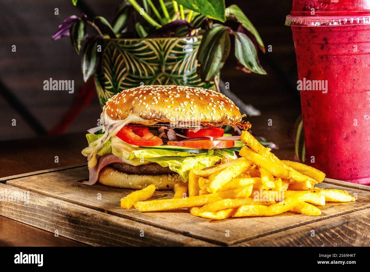 Hamburger with French fries and strawberry water Stock Photo - Alamy