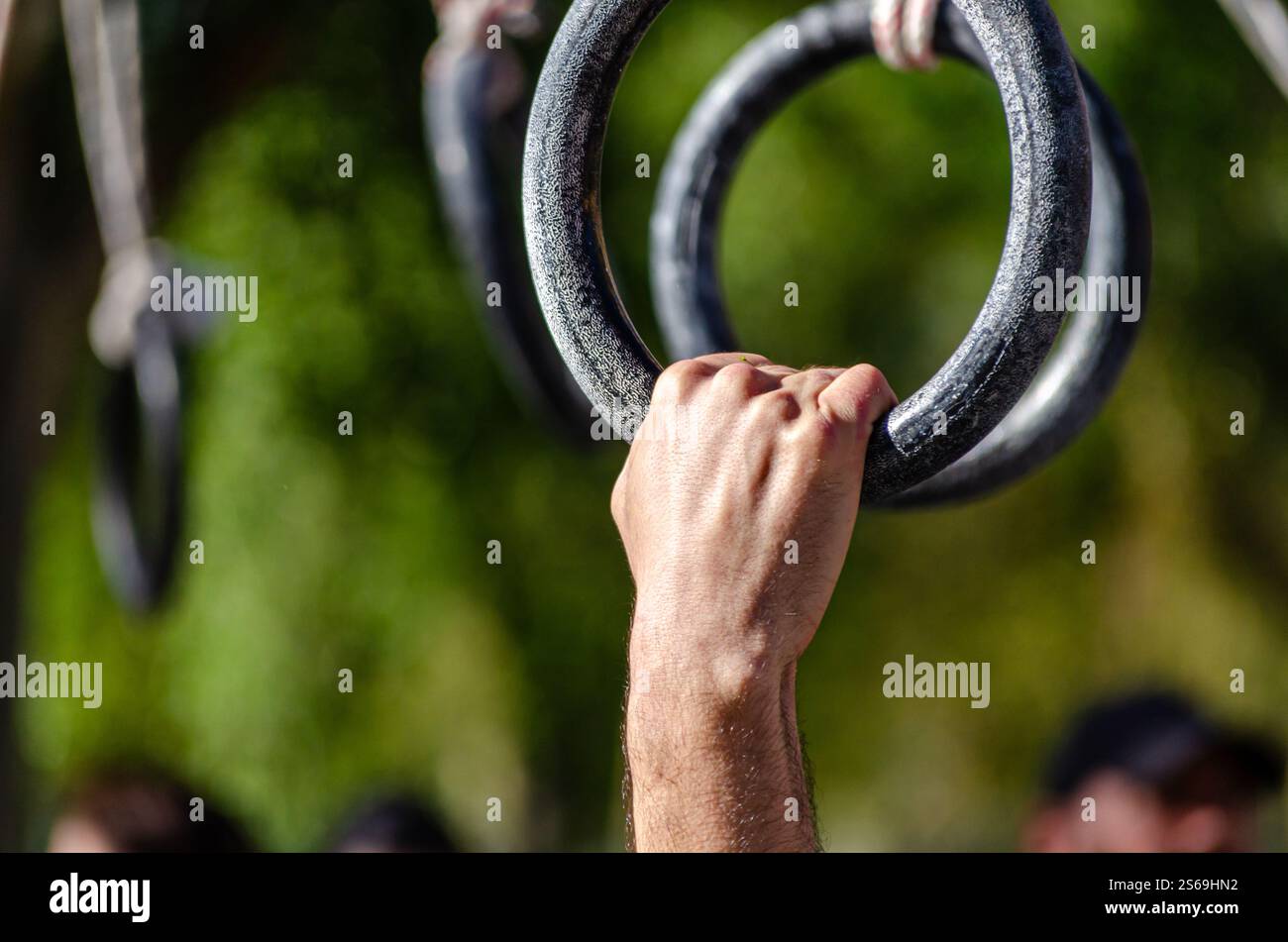Hand gripping obstacle in hi-res stock photography and images - Alamy