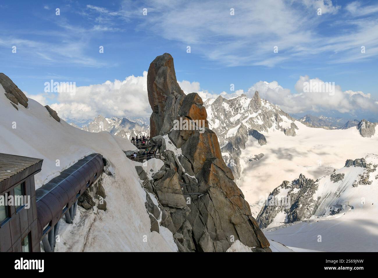 Aiguille du Midi cable car with the Grand Gendarme of the Cosmique Ridges and the Dent du Geant ...