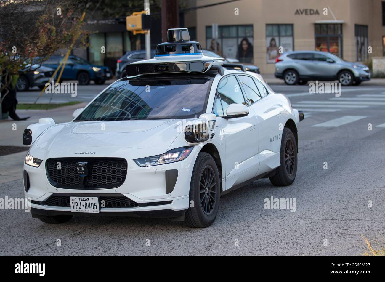Waymo self-driving cars like this one are a common sight in the streets ...
