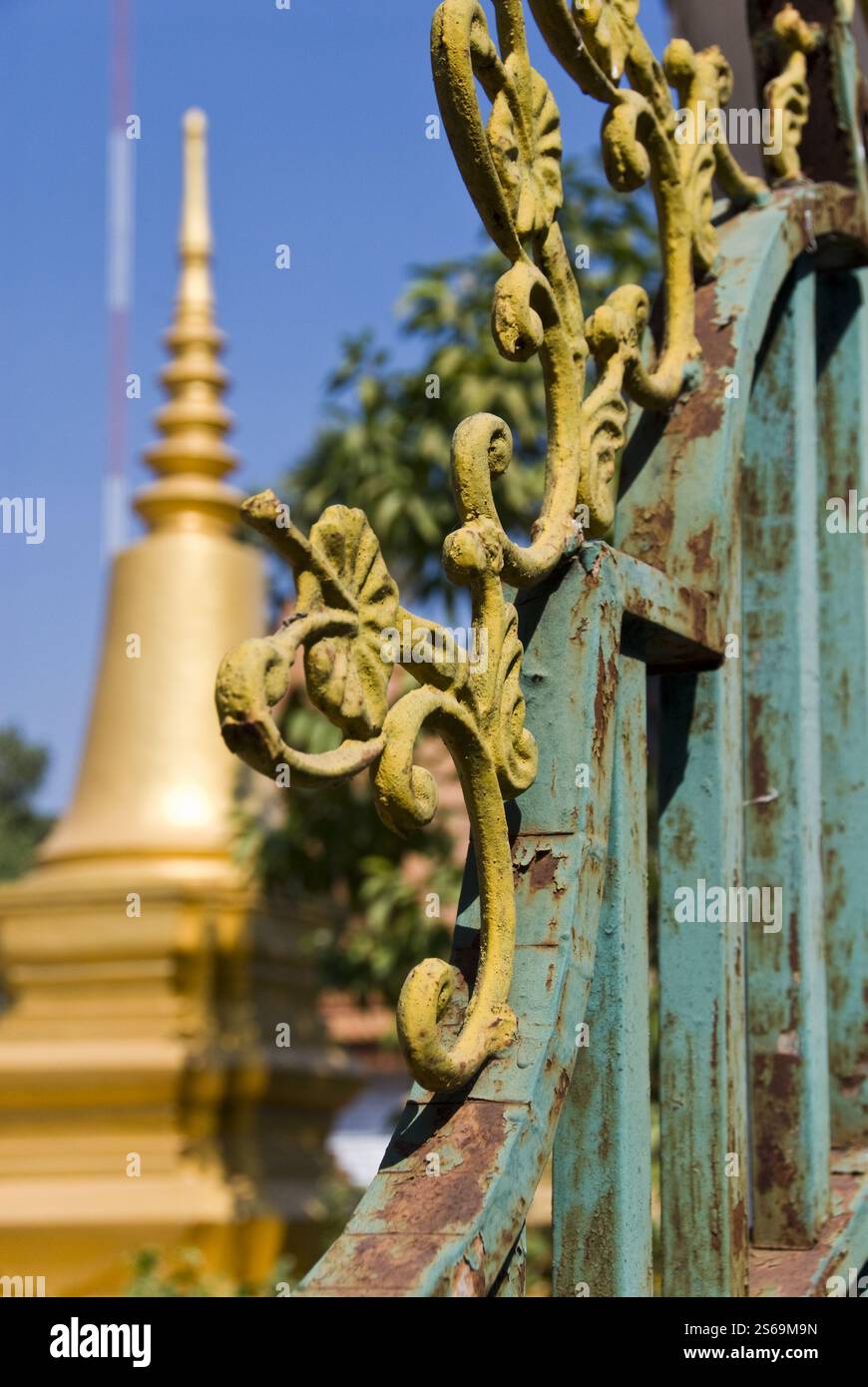 Painted iron gates guard Wat Bo, one of the oldest Buddhist temples in ...